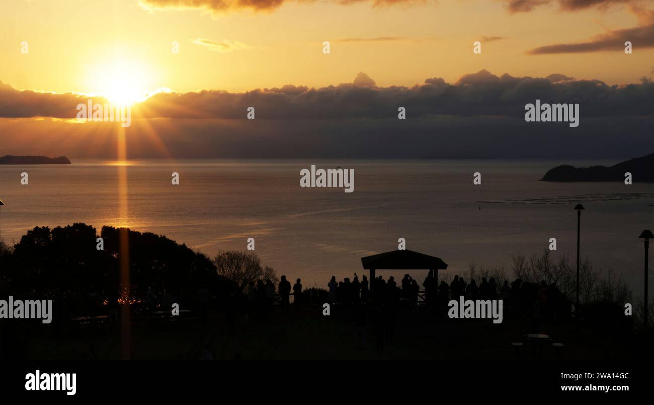The first sunrise of the year shines on the Seto Inland Sea in Kure ...