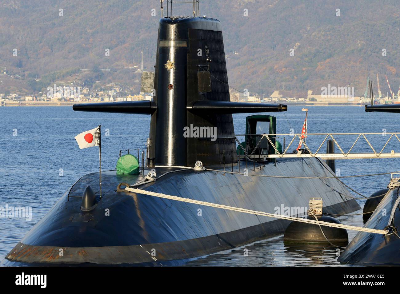 A submarine of Japan Maritime Self Defense Forces (JMSDF) with a New ...