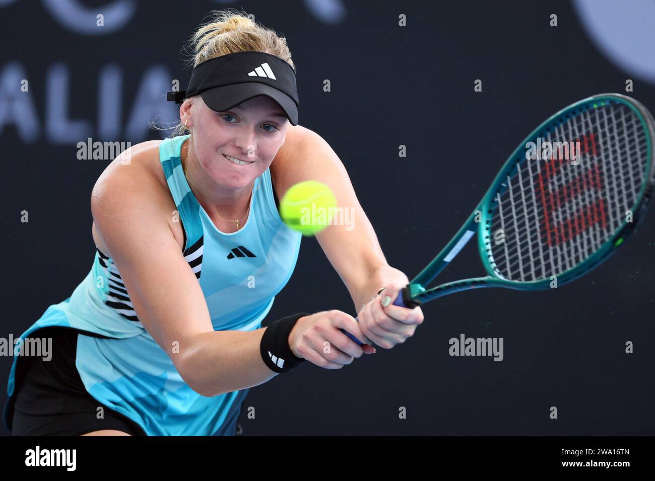 Ashlyn Krueger of the U.S. plays a shot in her match against Lucia ...