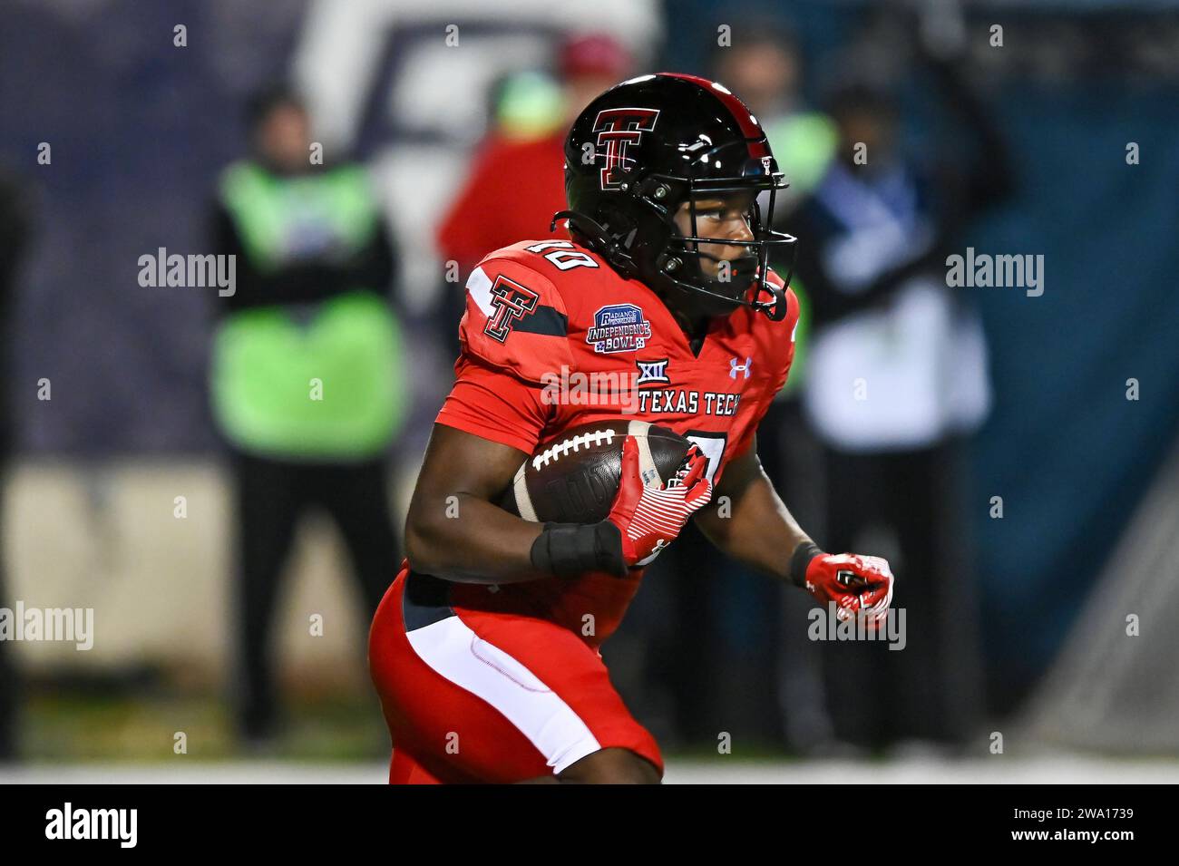 Shreveport, LA, USA. 16th Dec, 2023. Texas Tech wide receiver Drae McCray (10) runs the ball ...