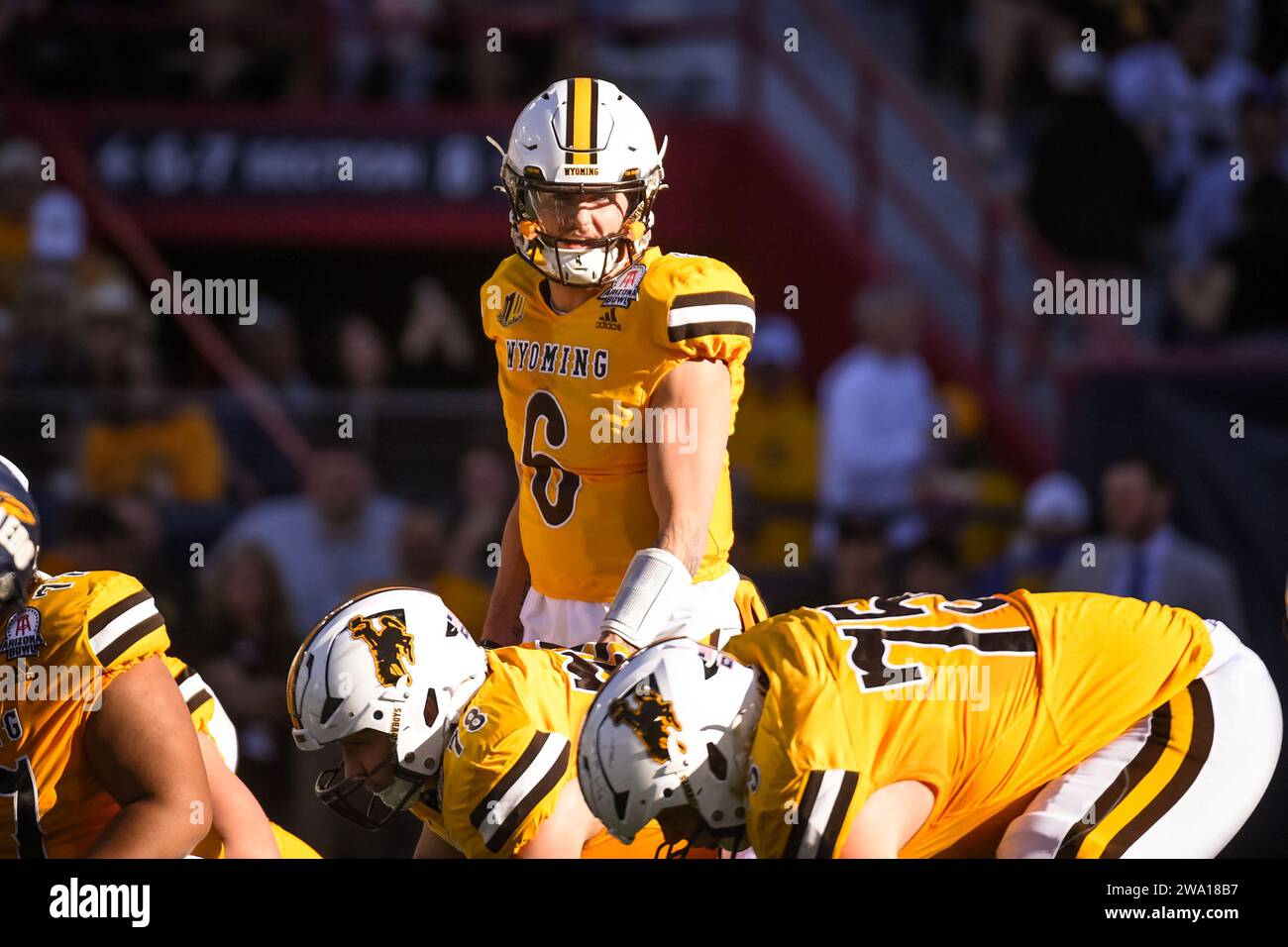 Wyoming Cowboys quarterback Andrew Peasley (6) prepares to hike the ...