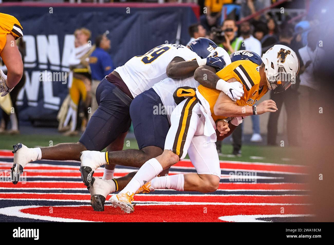 Tackled hi-res stock photography and images - Alamy