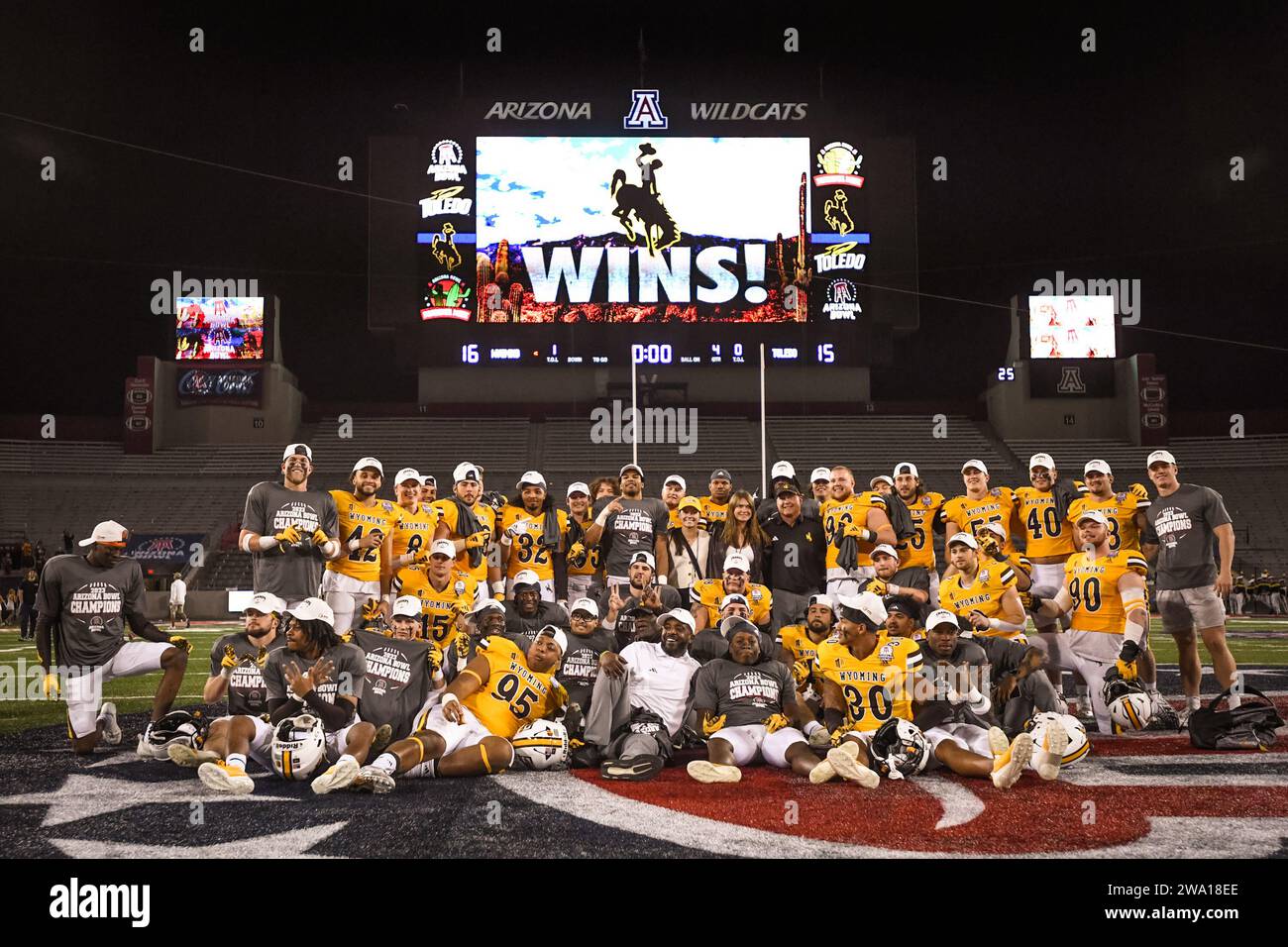 Wyoming Cowboys pose for a photo after an NCAA college football game ...