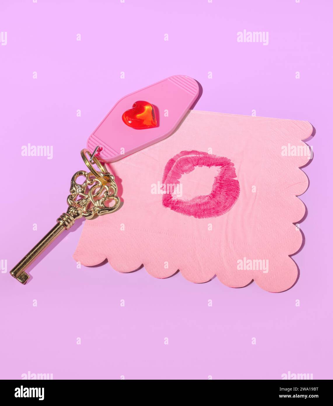 A Gold Skeleton Key with a Heart Shaped Hotel Room Tag, A Lipstick ...