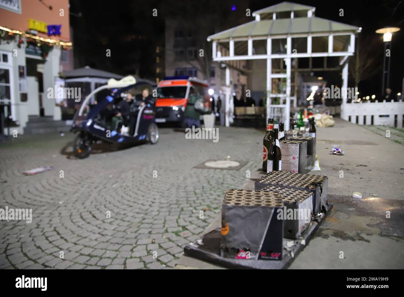 Cologne, Germany. 01st Jan, 2024. Burnt fireworks and empty bottles ...