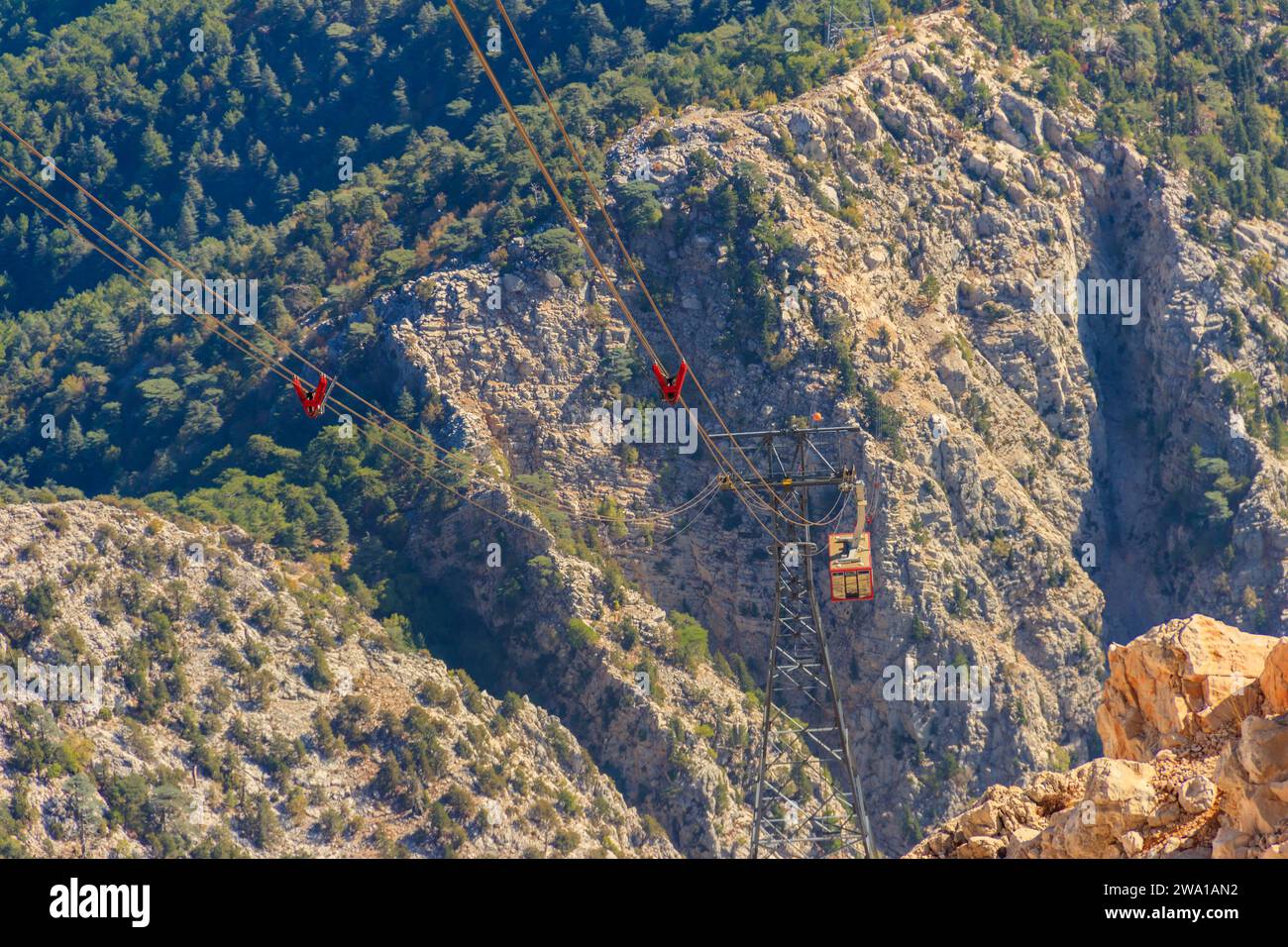 Cable car on ropeway leading to a top of Tahtali mountain in Antalya ...