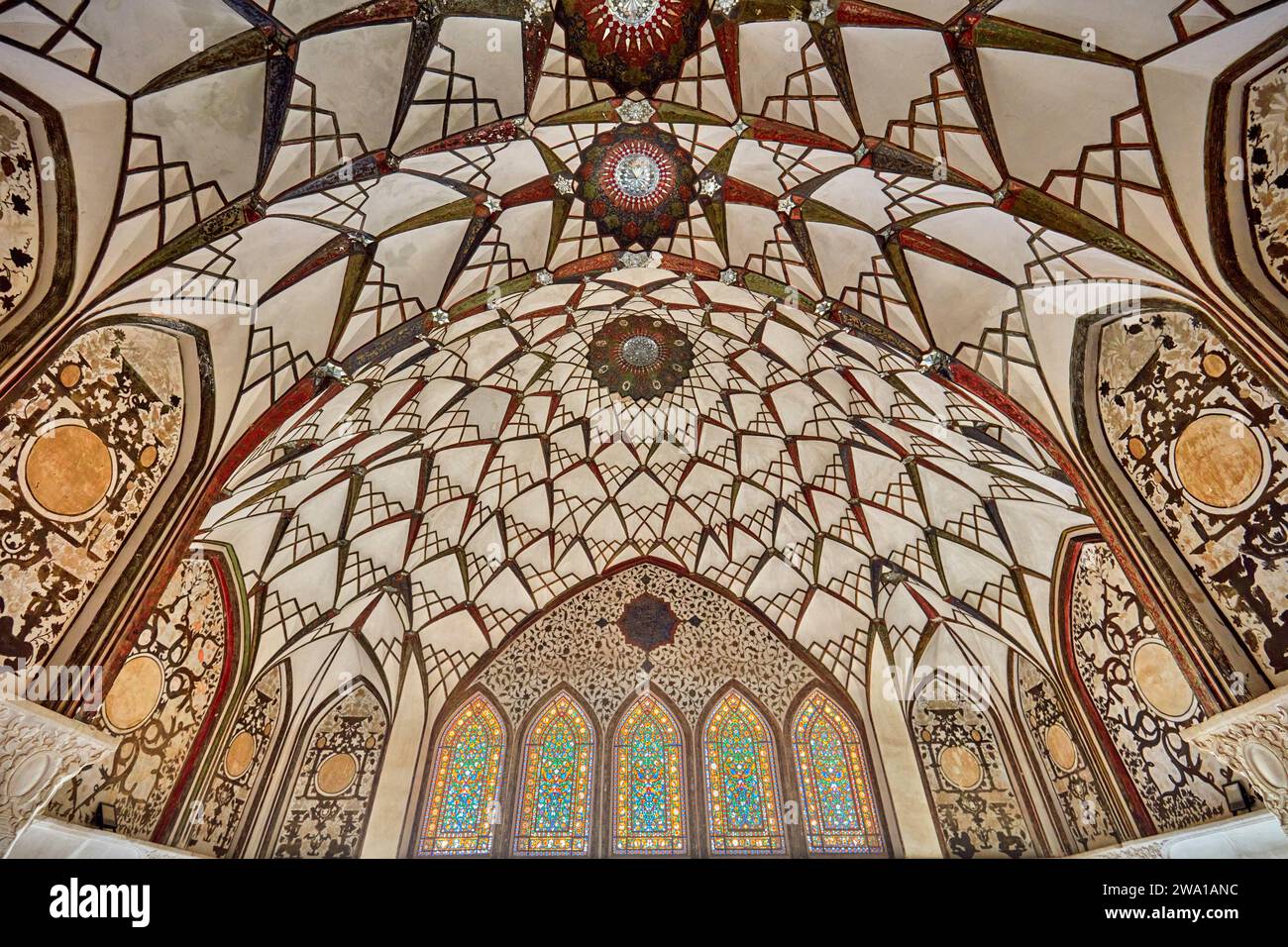 Richly decorated domed ceiling in one of the halls of the Tabatabaei ...