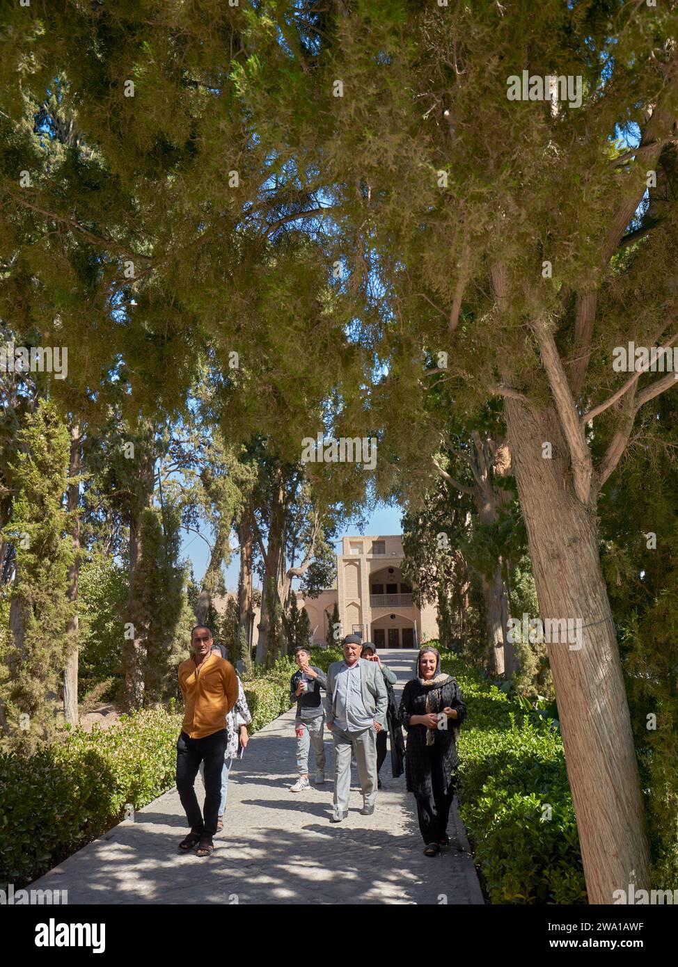 People walk in the Fin Garden (Bagh-e Fin), the oldest (1590) existing ...