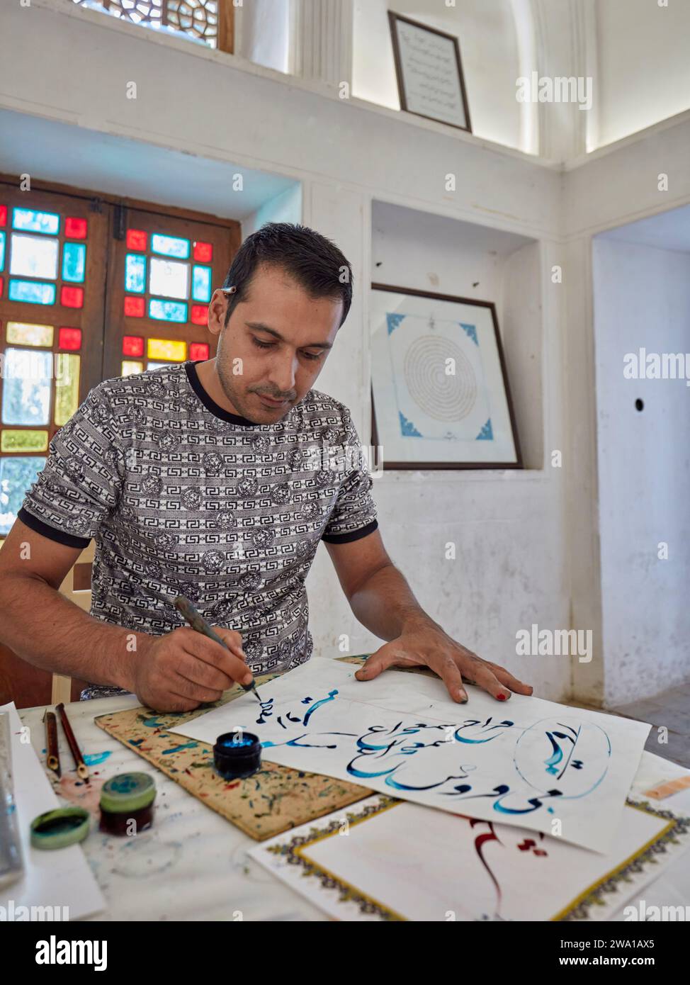 Calligrapher at work in the Fin Garden (Bagh-e Fin), oldest (1590 ...