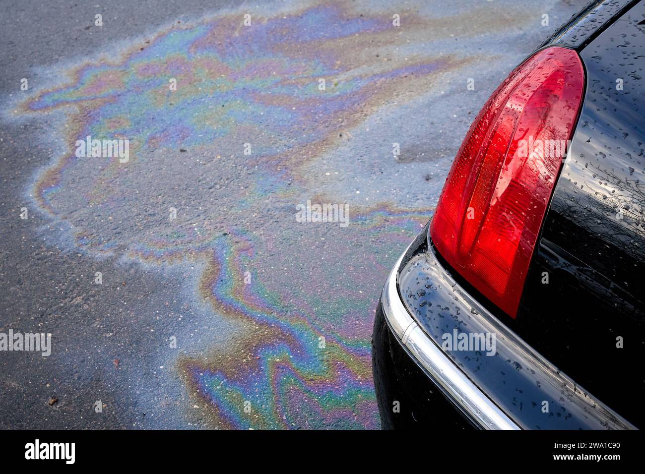 Engine oil stains of car. Leak under the car when the car is park Stock ...