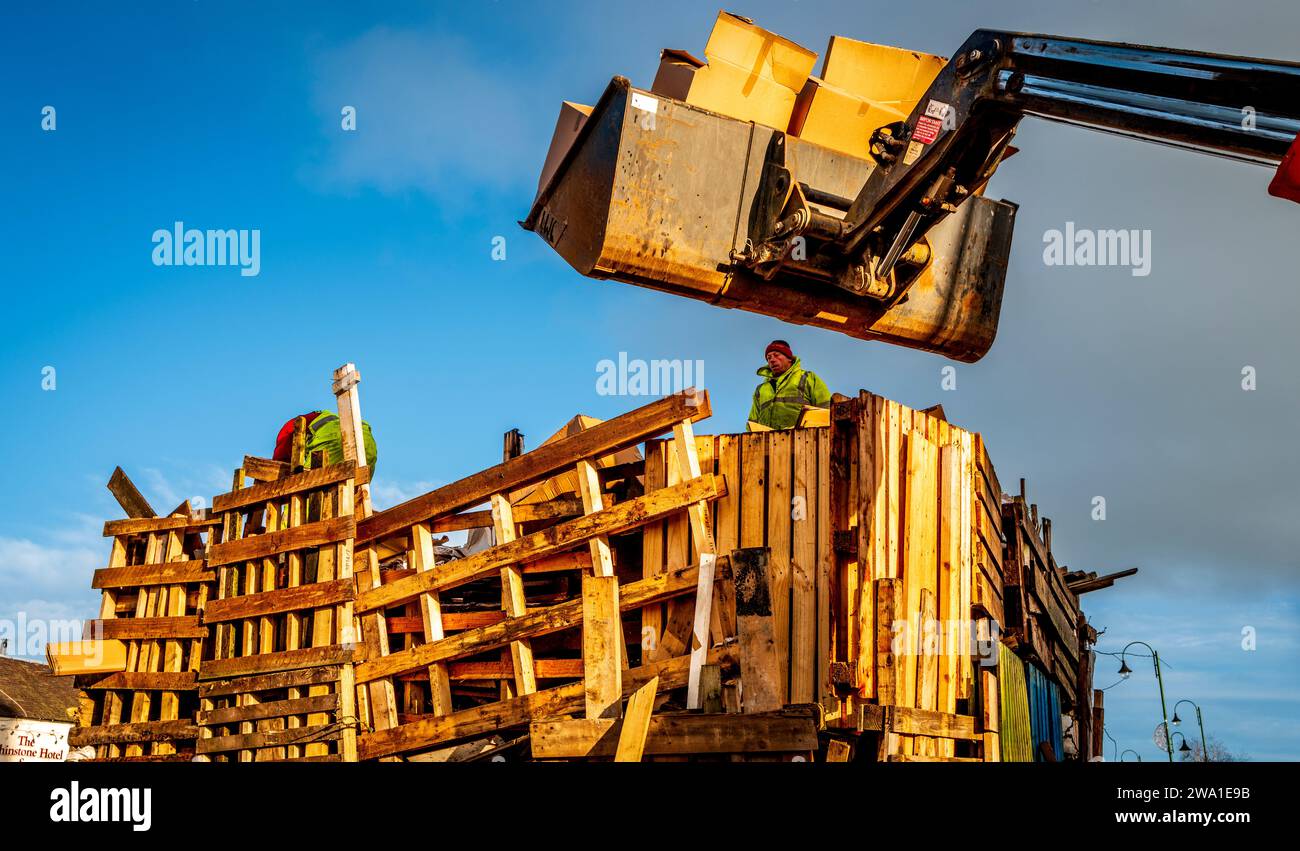 Building the traditional Biggar hogmanay bonfire in South Lanarkshire ...