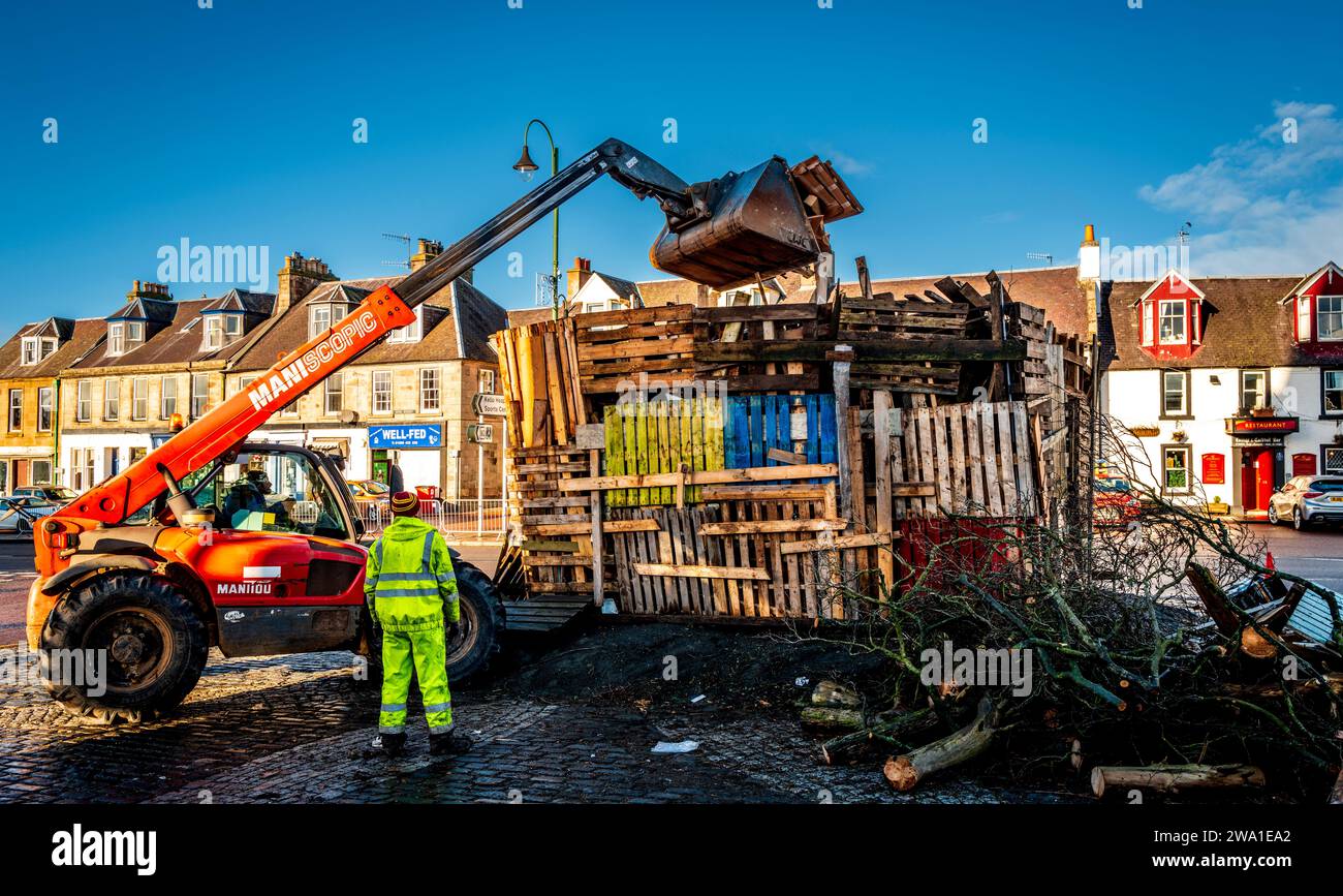 Building the traditional Biggar hogmanay bonfire in South Lanarkshire ...