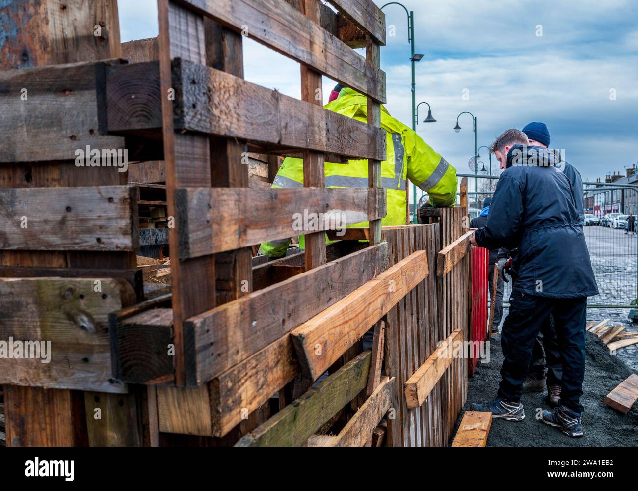 Building the traditional Biggar hogmanay bonfire in South Lanarkshire ...