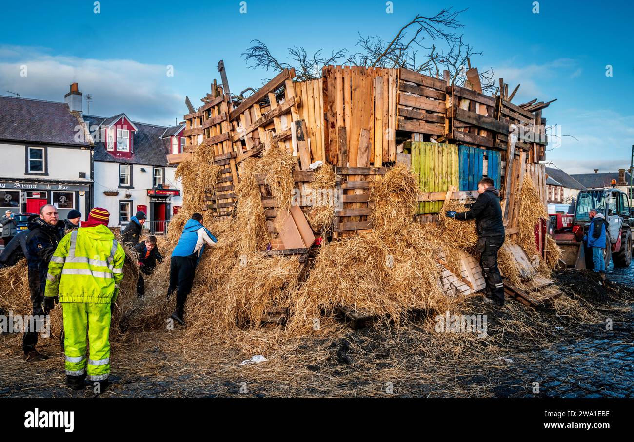 Building the traditional Biggar hogmanay bonfire in South Lanarkshire ...