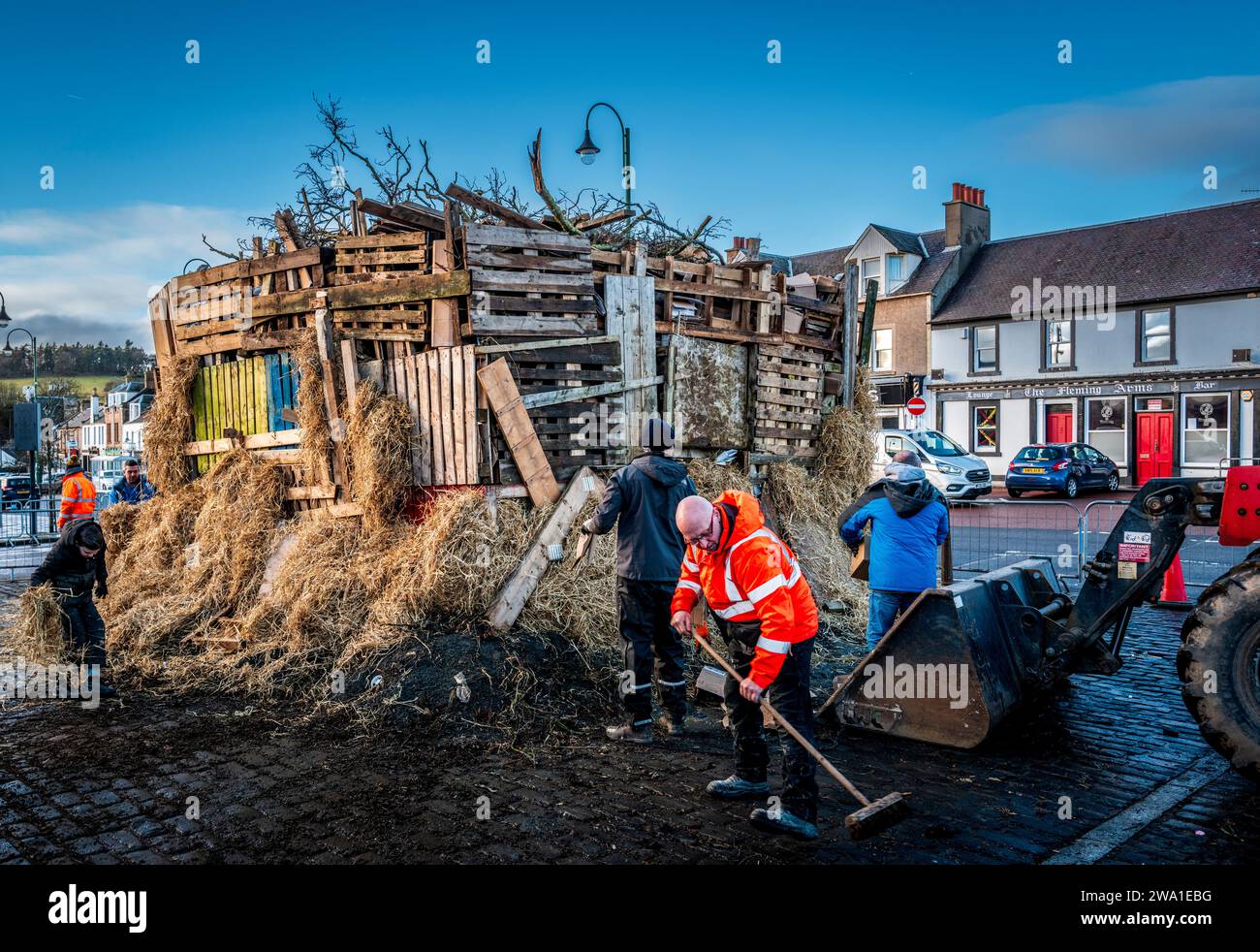 Building the traditional Biggar hogmanay bonfire in South Lanarkshire ...
