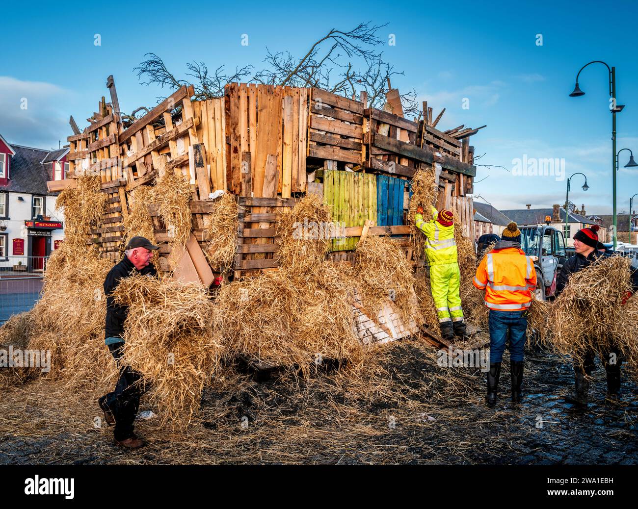 Building the traditional Biggar hogmanay bonfire in South Lanarkshire ...
