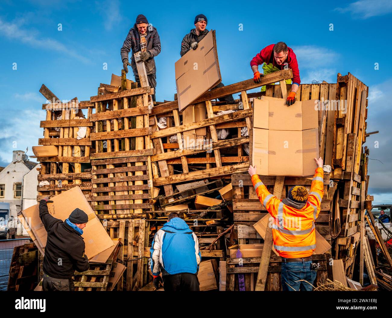 Building the traditional Biggar hogmanay bonfire in South Lanarkshire ...