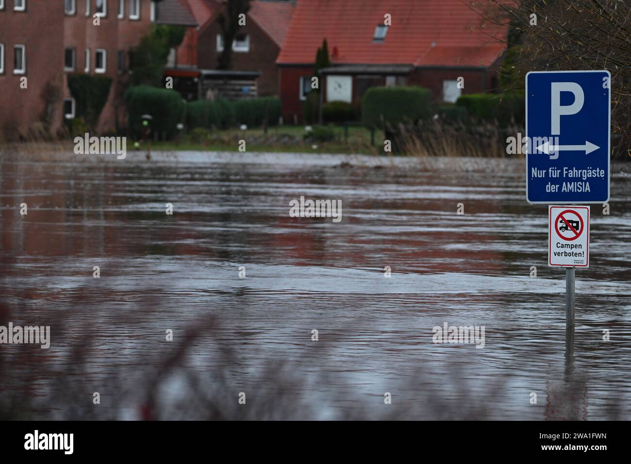 Haren, Germany. 01st Jan, 2024. The high water of the Ems reaches right ...