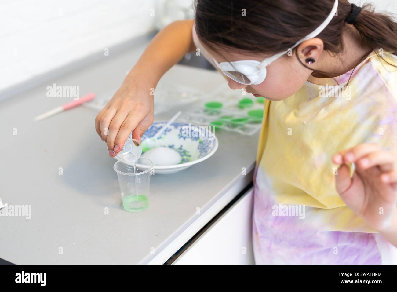 Children are learning and doing science experiments. Little girl ...