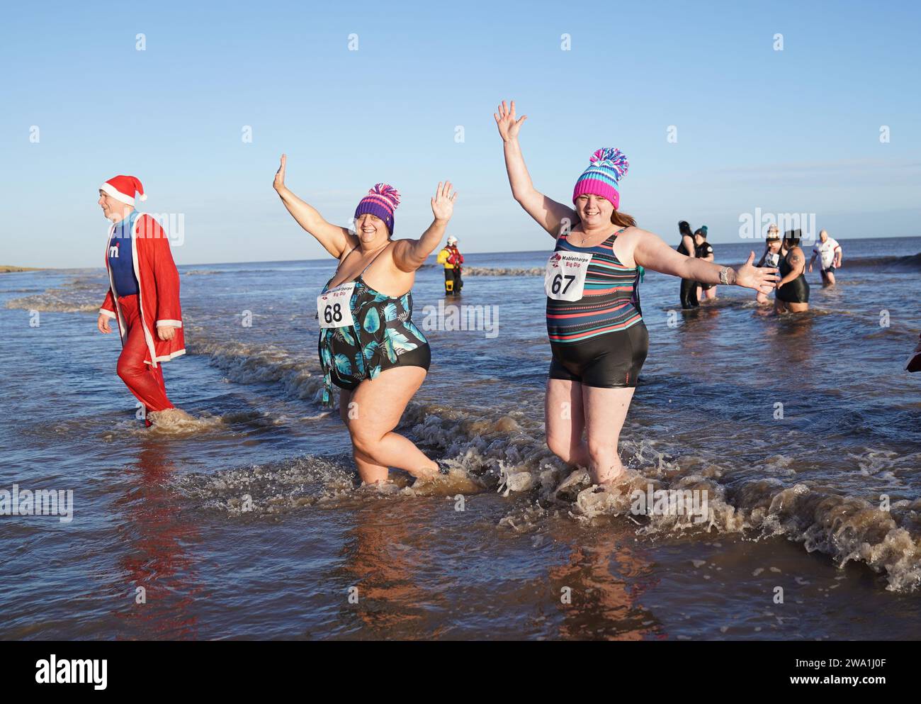 People take part in the New Year's day Mablethorpe Big Dip in ...