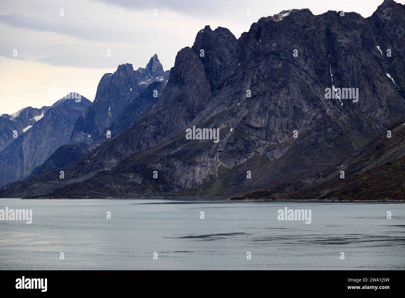 Mountain range in a bay of the Kangerlussuaq fjord Greenland, Denmark ...