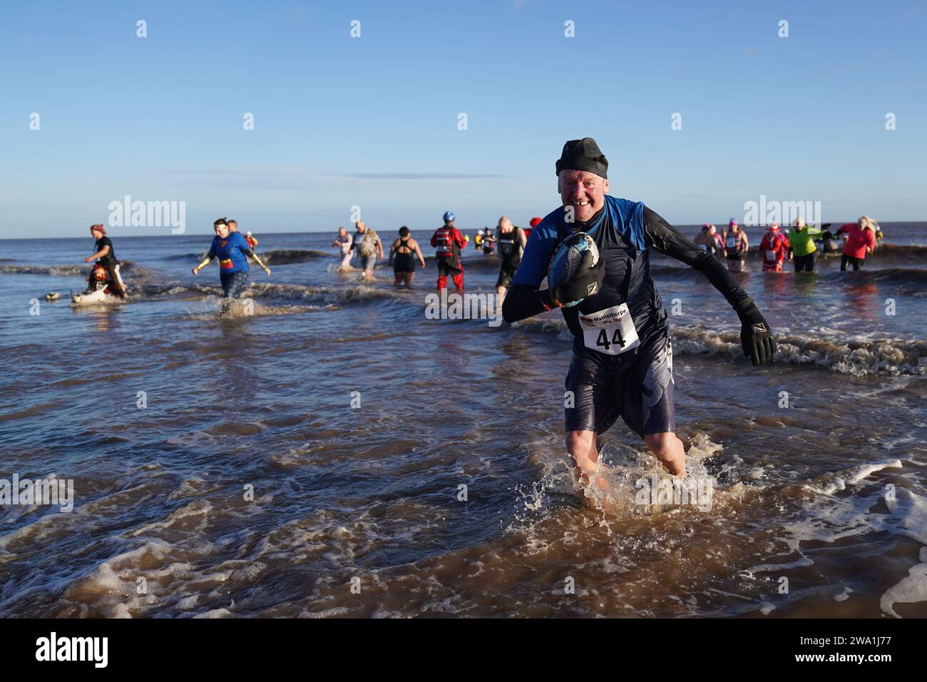 People take part in the Mablethorpe Big Dip on New Year's day in ...