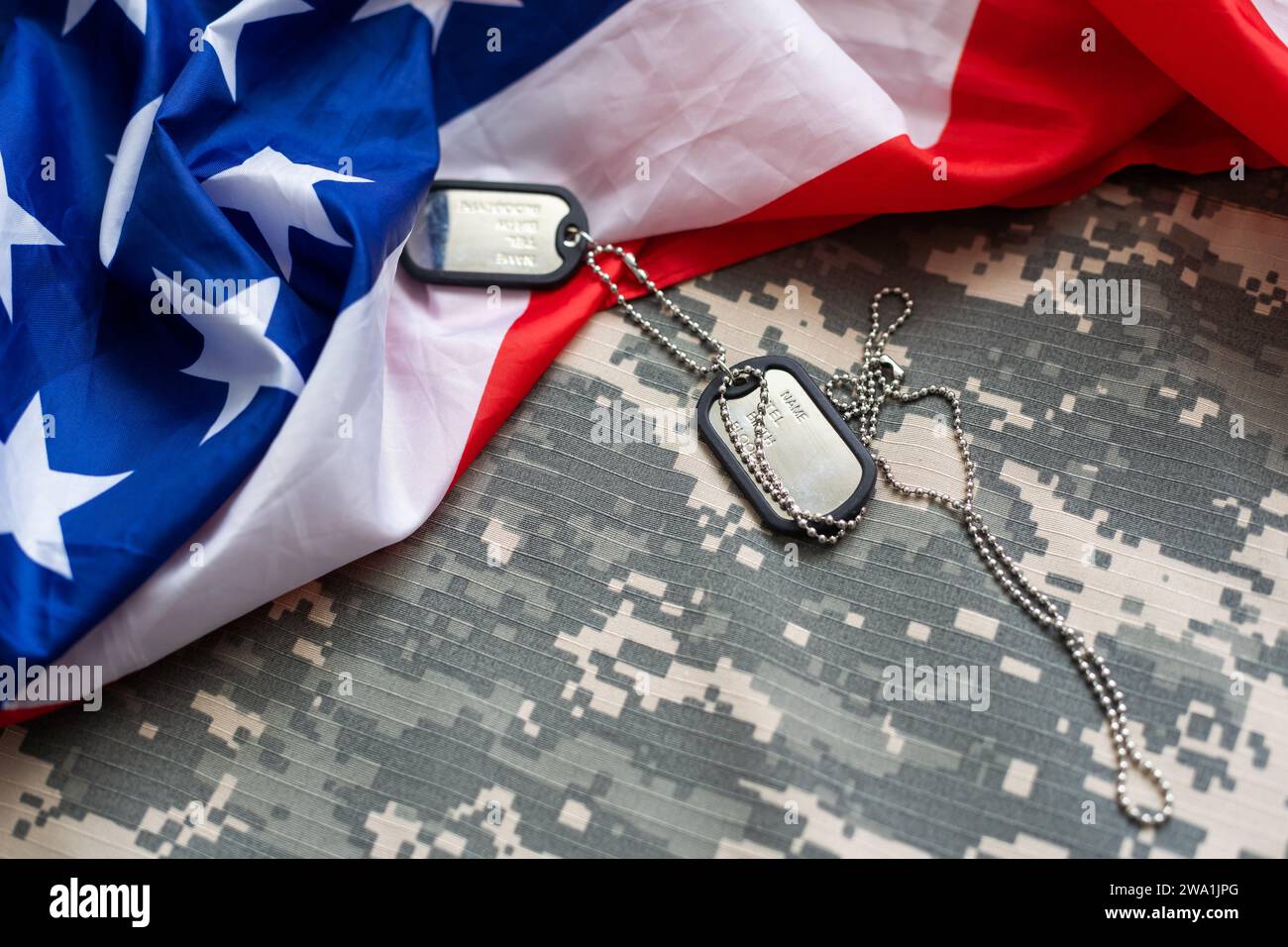 Army tokens on military uniform and USA national flag background Stock ...