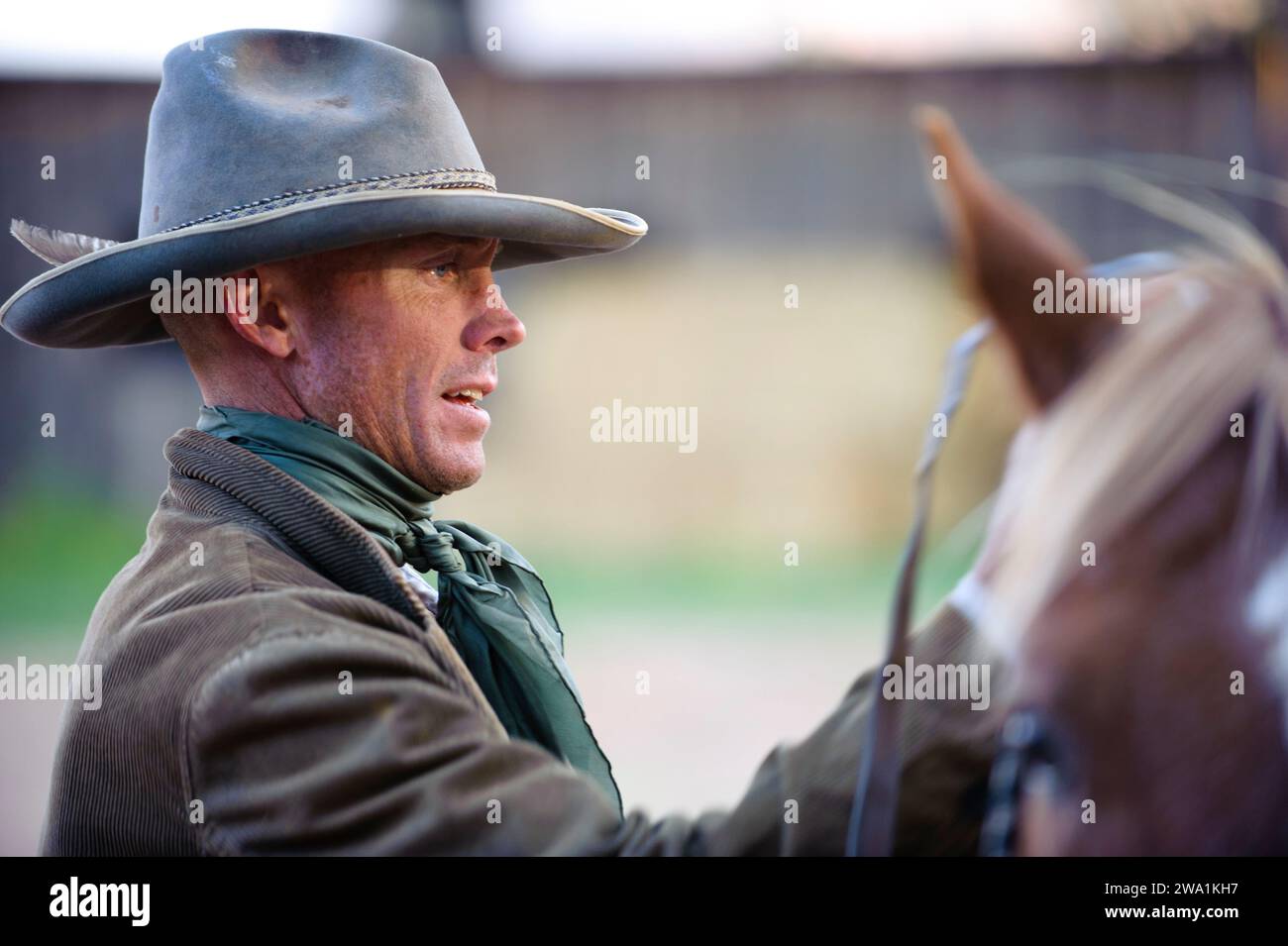 Cattle rancher readying to ride, next to Canyonlands NP, UT Stock Photo ...