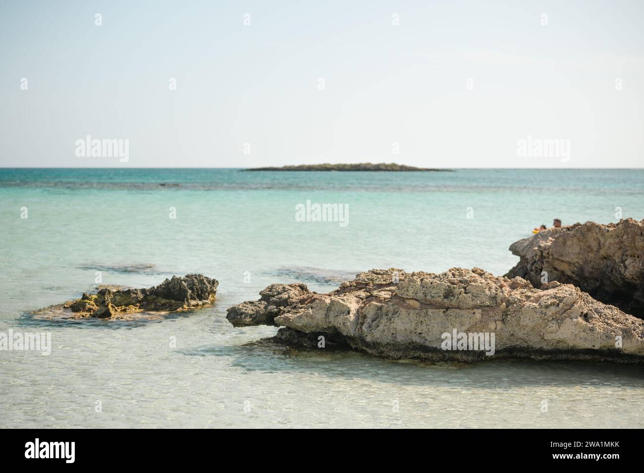 Crystal clear waters and rock formations at Elafonissi beach on Crete ...