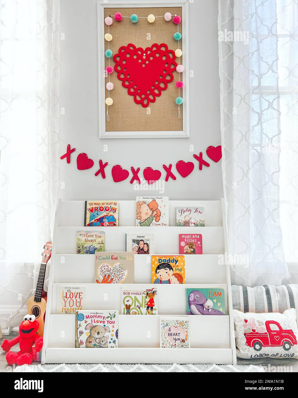 Display Bookcase of Valentine Themed Books for Children Stock Photo - Alamy