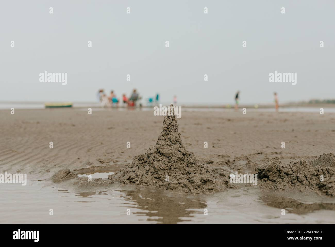 Drip sand castle on the sandbar in summer Stock Photo - Alamy