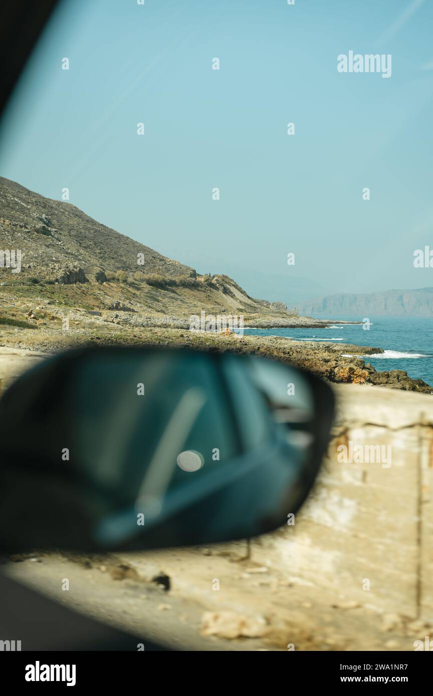 Car window view of the coastline of Crete island in the Mediterranean ...