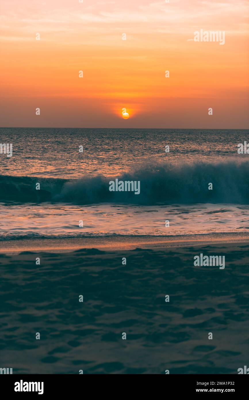 Golden hour beach sea waves hi-res stock photography and images - Alamy