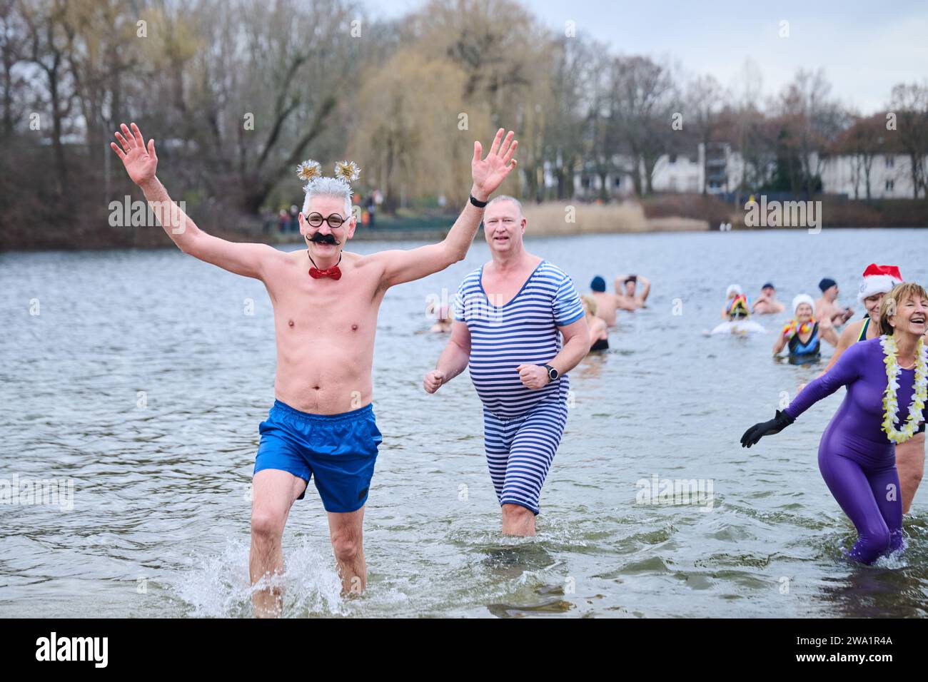 Berlin, Germany. 01st Jan, 2024. Costumed winter swimmers from the ...