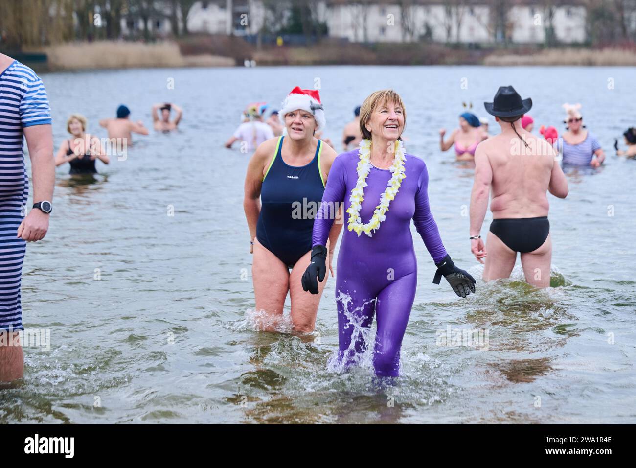 Berlin, Germany. 01st Jan, 2024. Costumed winter swimmers from the ...
