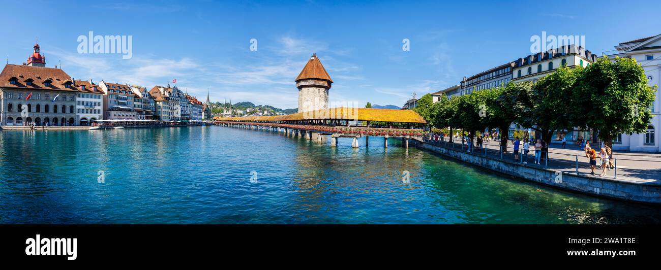 The historic wooden Chapel Bridge (Kapellbrucke) spanning the River ...