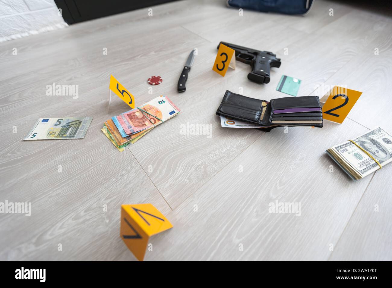 High contrast image of a crime scene with evidence markers Stock Photo ...