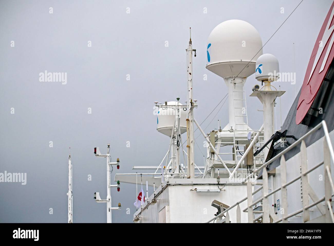 a ship's superstructure with radar and navigation domes and aerials ...
