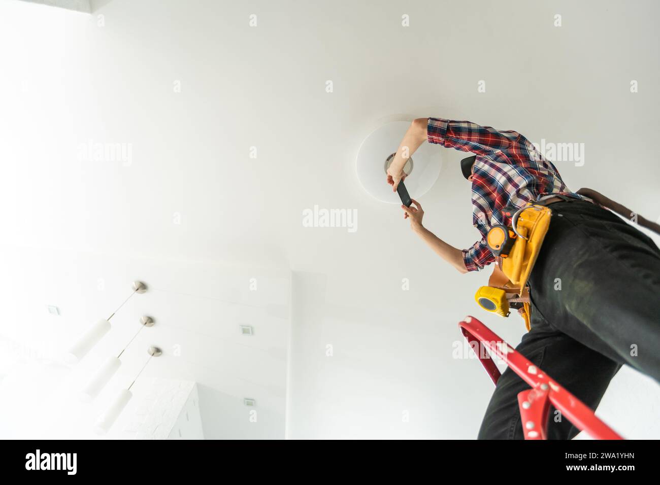 Electrician man change led light hi-res stock photography and images ...