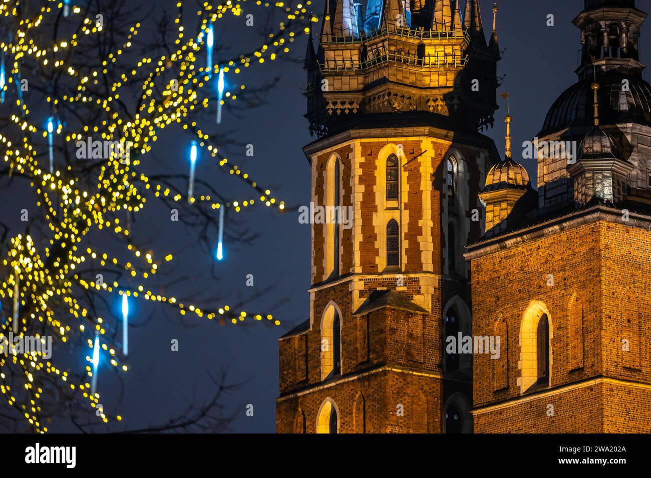 The tower of St. Mary's Basilica in Krakow against the background of ...