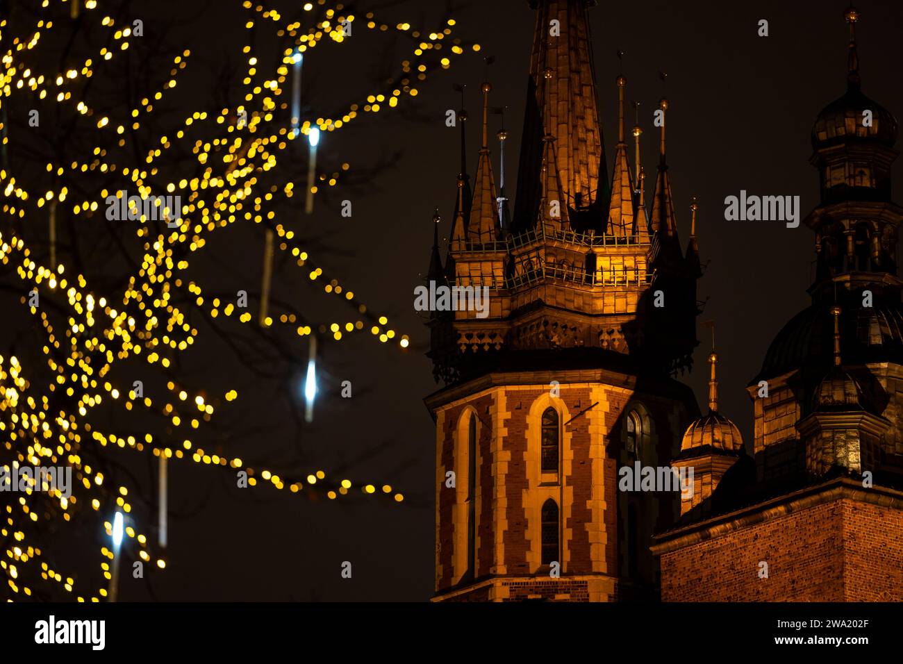 The tower of St. Mary's Basilica in Krakow against the background of ...