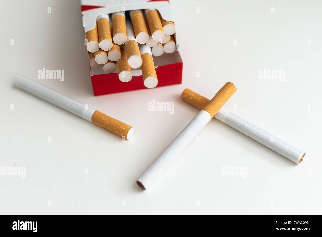 Pack full of filtered cigarettes on white isolated background Stock ...