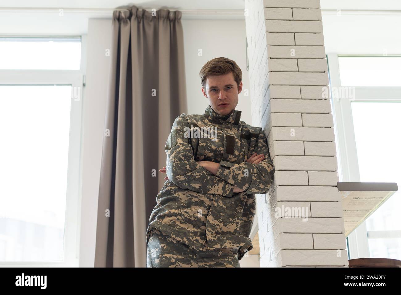 Stressed veteran soldier engrossed in depressive thoughts and memories ...