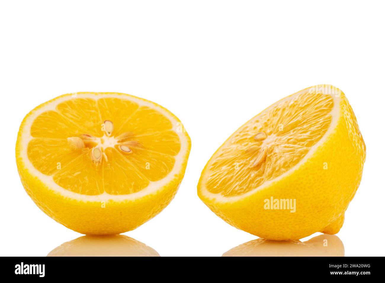 Two halves of yellow juicy lemon, close-up, isolated on white Stock Photo - Alamy