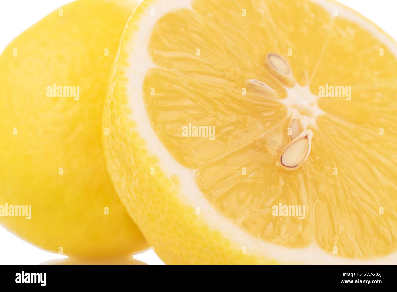 Two halves of yellow juicy lemon, close-up, isolated on white Stock ...