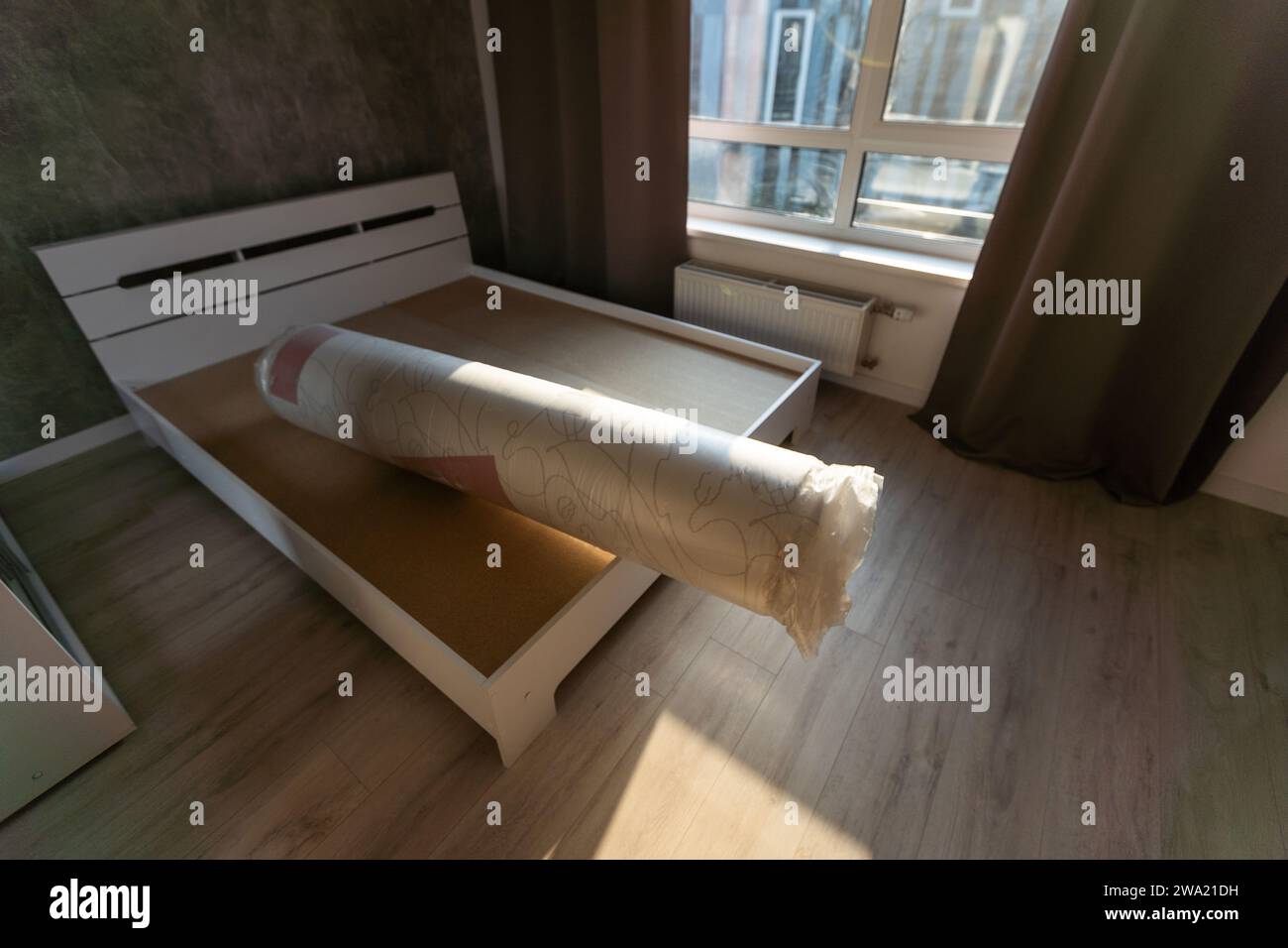 Top view brand new roll-packed spring mattresses Stock Photo - Alamy