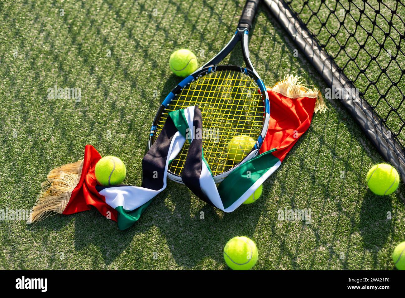ball and tennis racket close-up. ball and racket on the tennis court ...