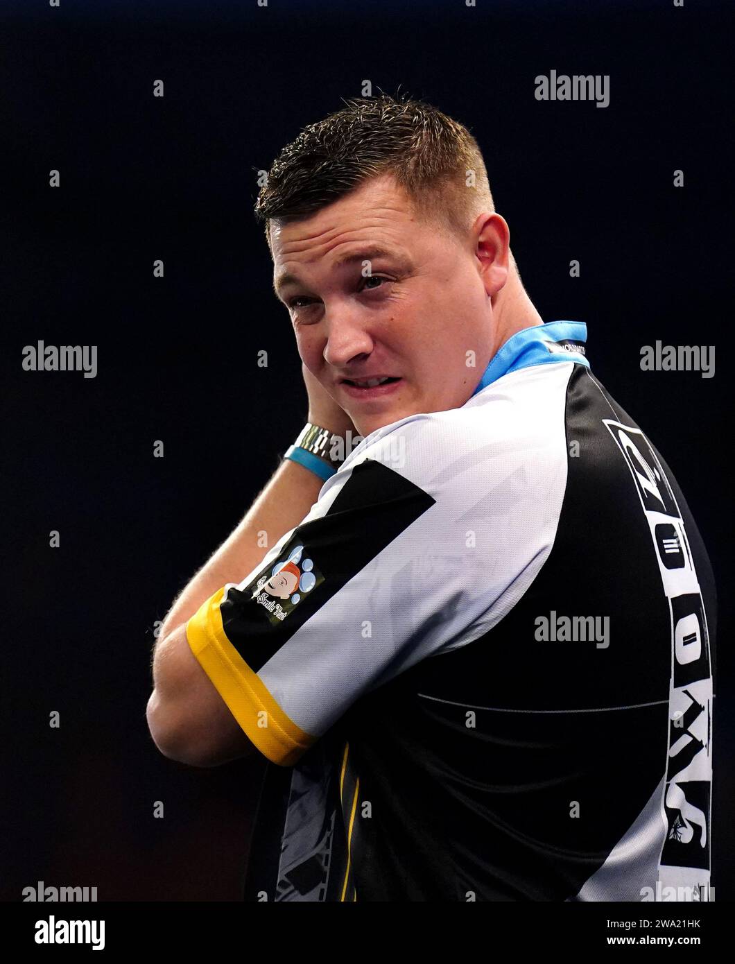 Chris Dobey in action against Rob Cross (not pictured) on day fourteen ...