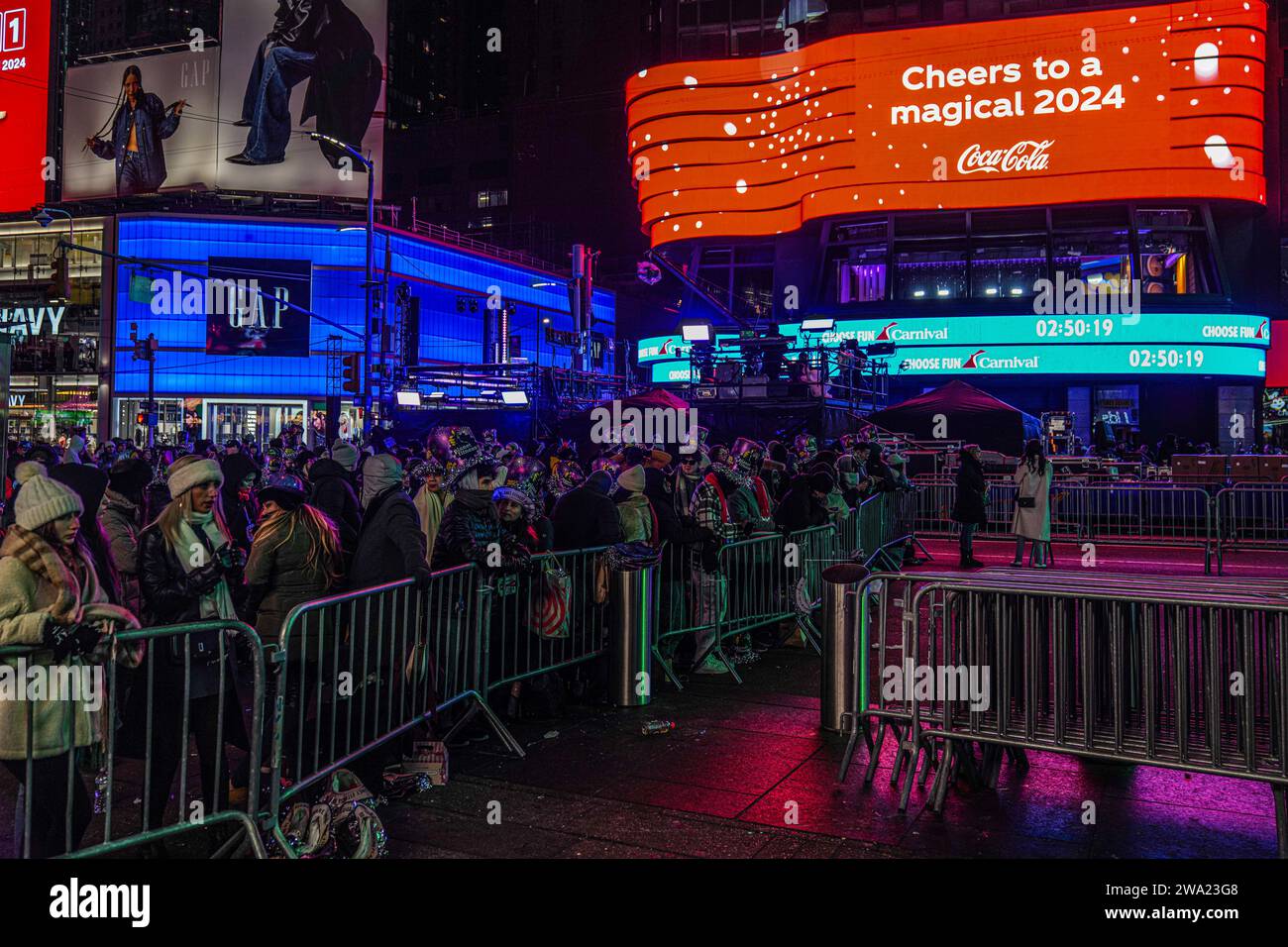 People gather at Times Square during the celebration. The 2024 Times ...