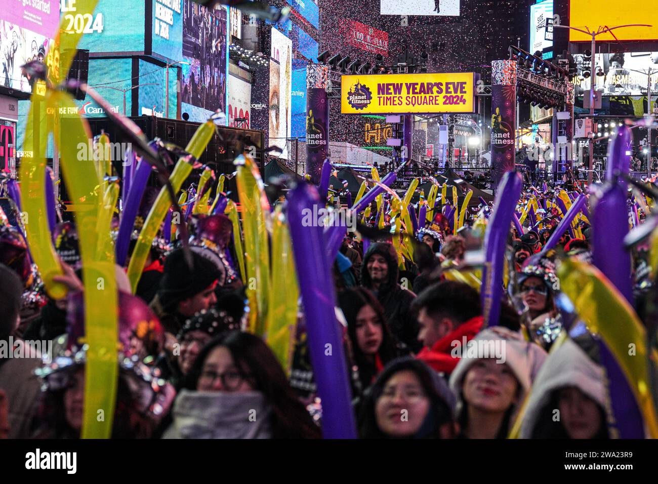 Revelers wait at Times Square for counting down to 2024. The 2024 Times ...